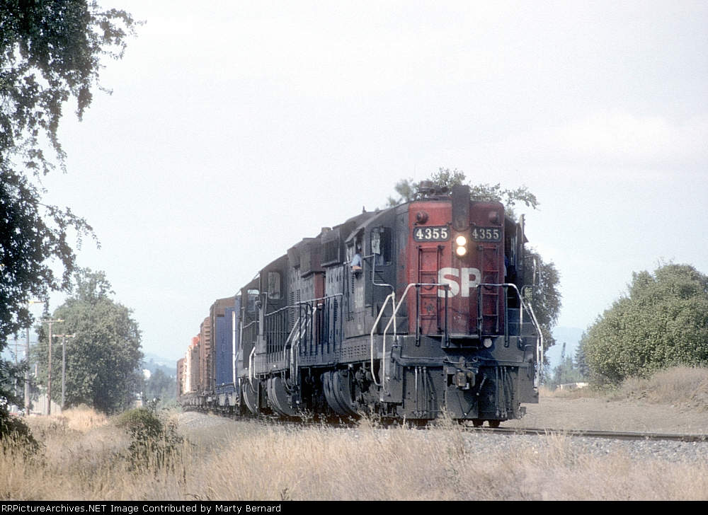 Three Cadillacs Working